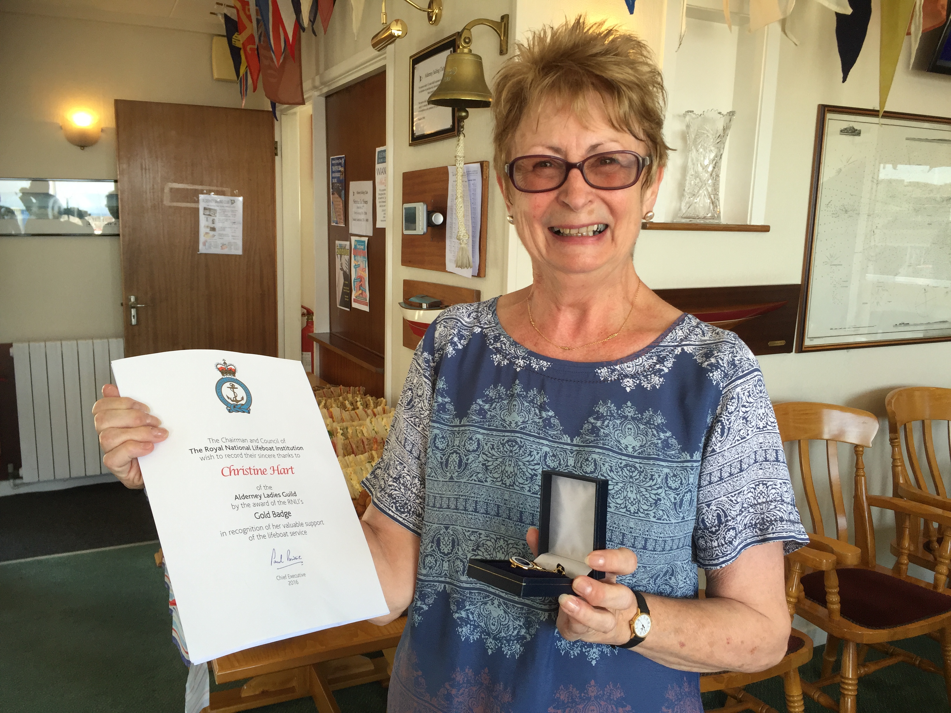 Chairwoman of Alderney RNLI Ladies Guild receives RNLI Gold Badge Award ...