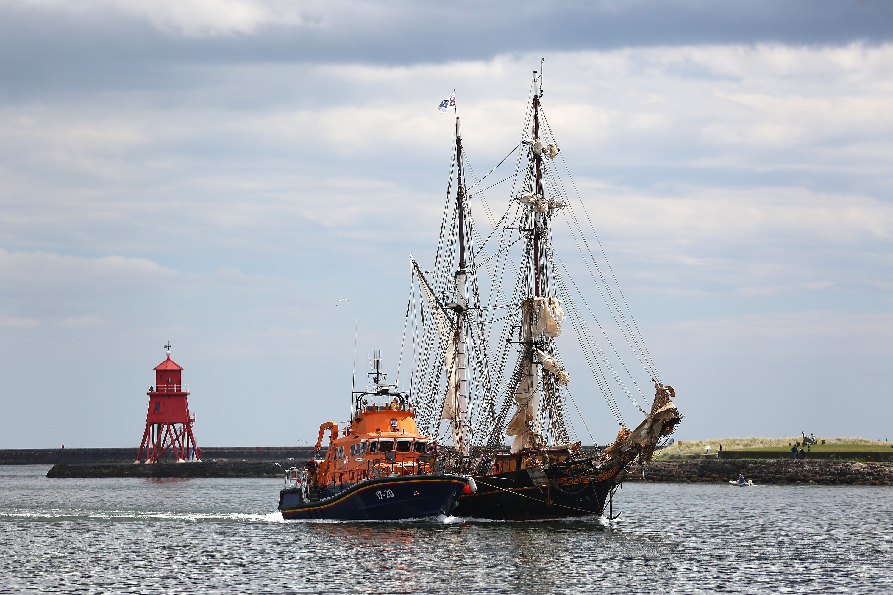 World’s only Engineless Sailing Cargo Ship towed to safety. | RNLI