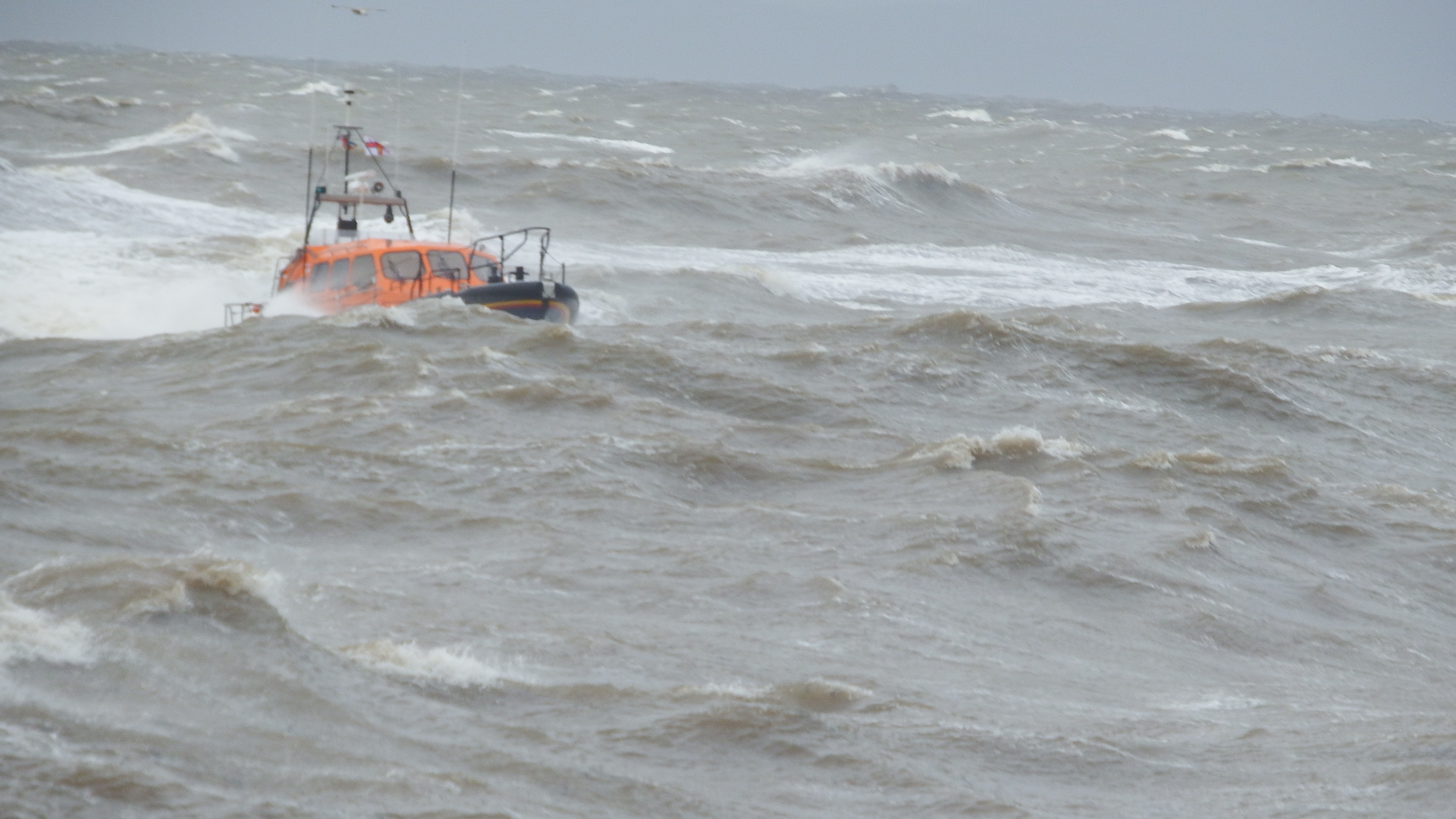 Workington RNLI lifeboat battles storm to secure dangerously swinging ...