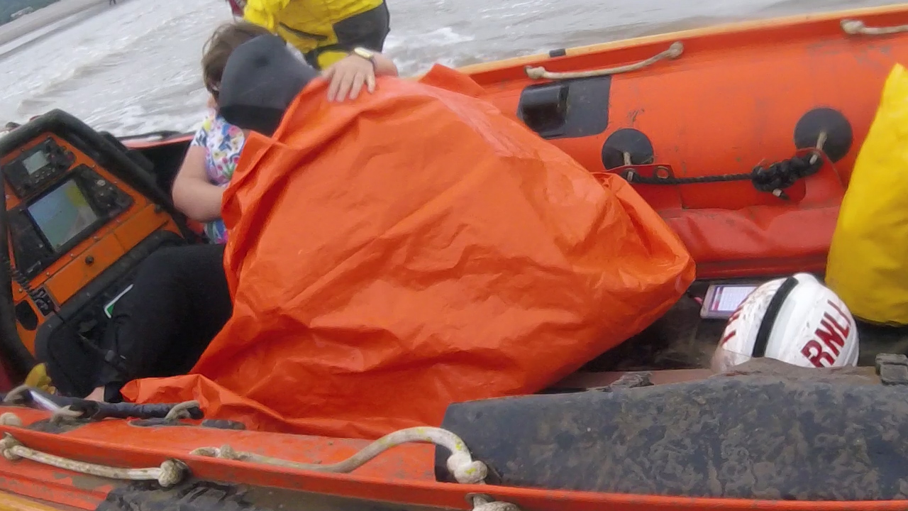 Teamwork between multiple agencies rescue person in the sea | RNLI