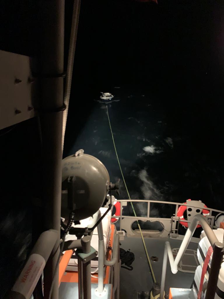 Fowey RNLI lifeboat crew rescue family and dog on broken-down boat | RNLI
