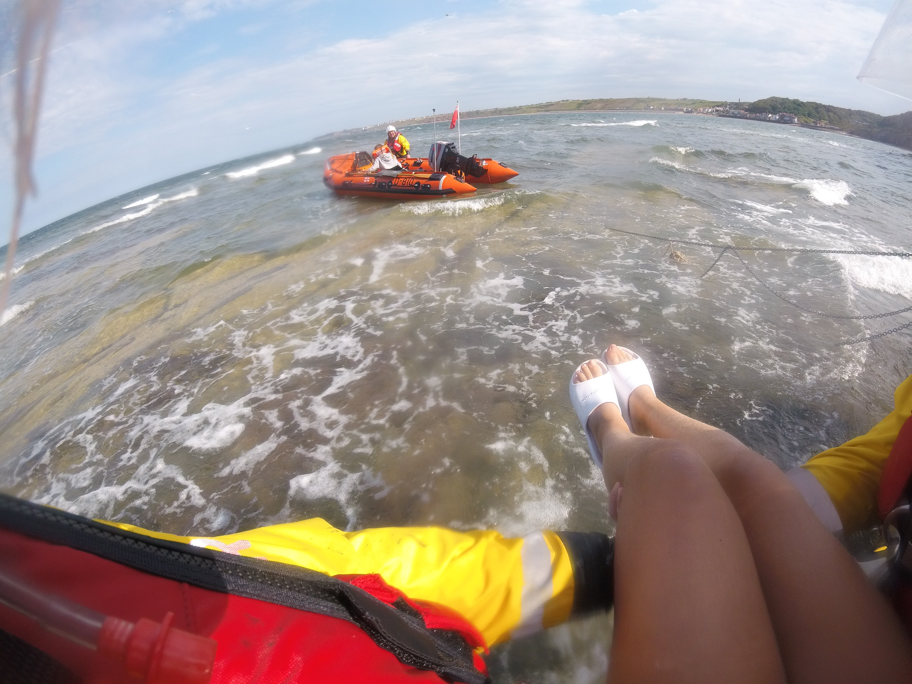 Whitby RNLI rescue passengers from boat stranded on rocks at Sandsend ...