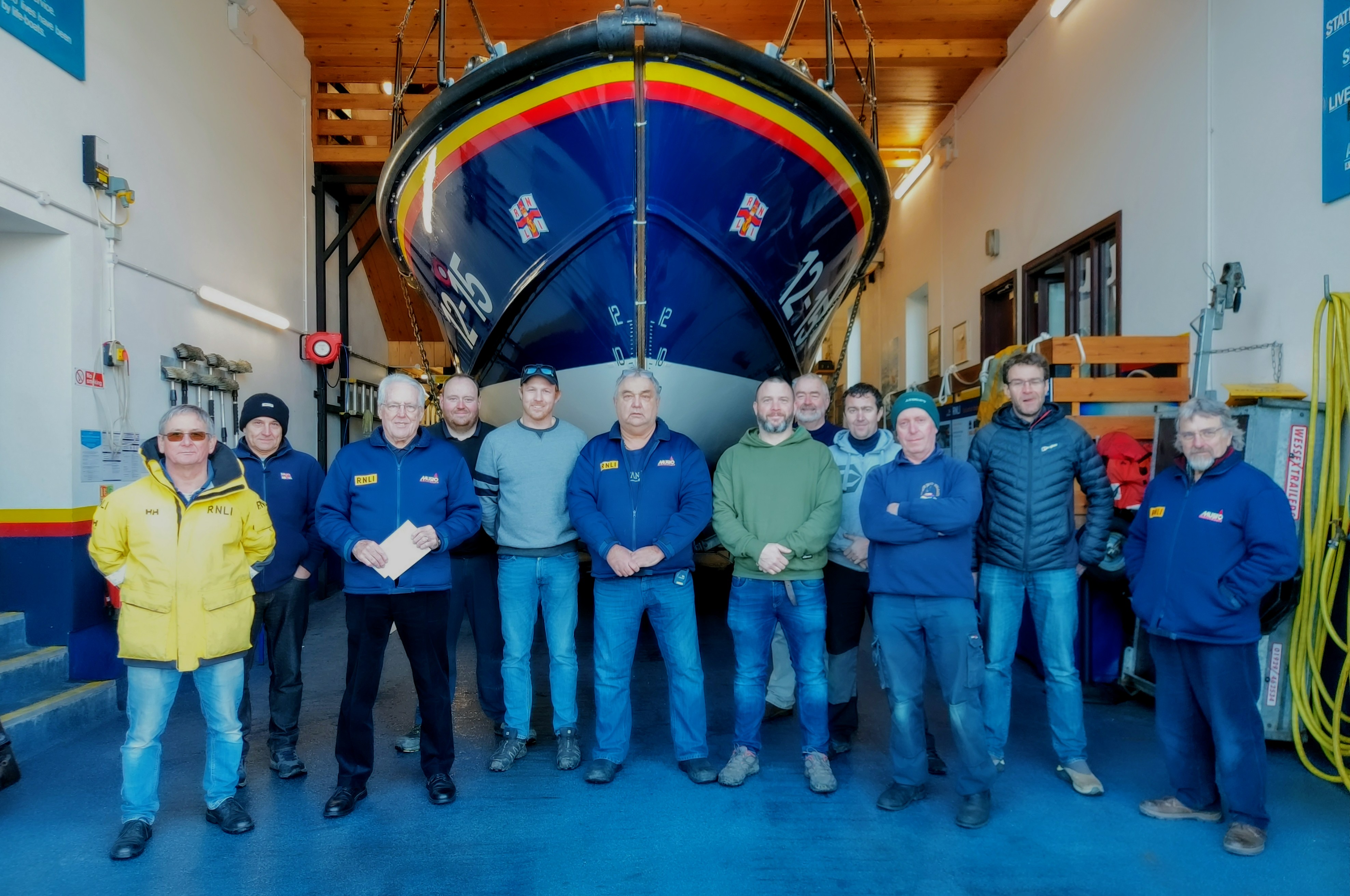 New Quay RNLI crew awarded for rescuing rowers in storm force ...
