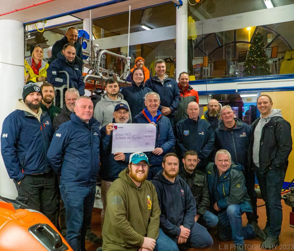 Blackpool RNLI volunteers catch a cheque from fishing competition | RNLI