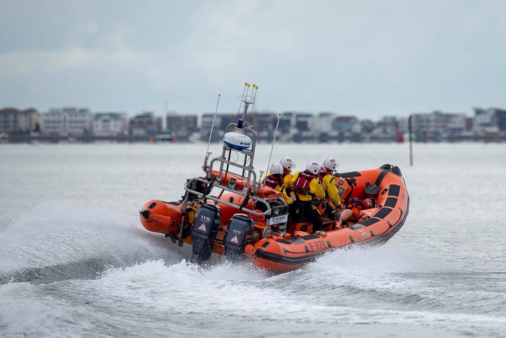 Poole lifeboat assist yacht taking on water and an emergency beacon ...