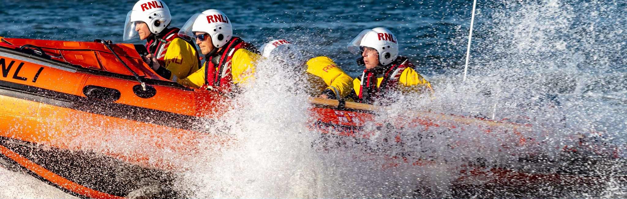 Wells inshore lifeboat Peter Wilcox assists two people cut off by tide ...